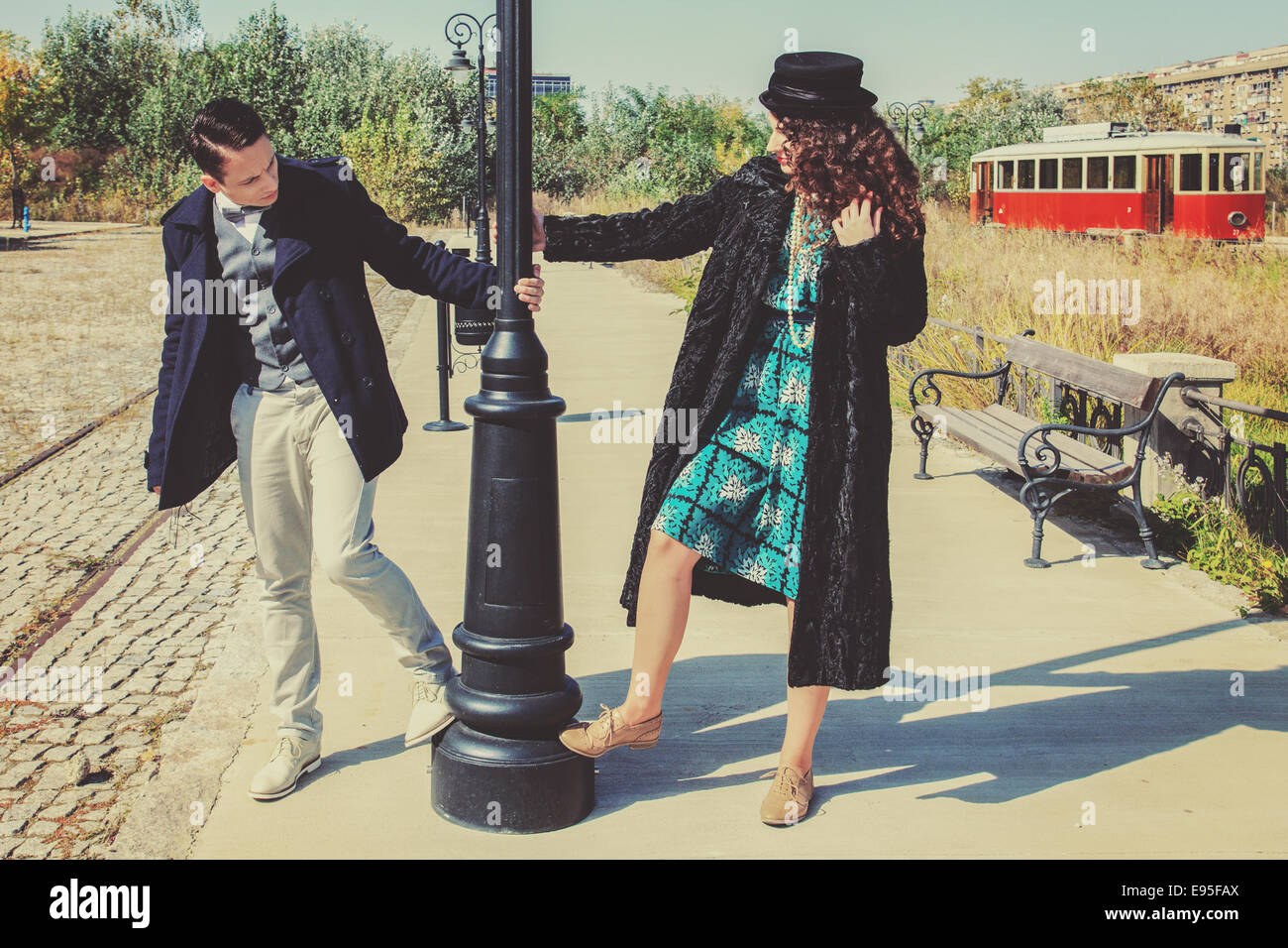 Woman holding on to rail hi-res stock photography and images - Alamy