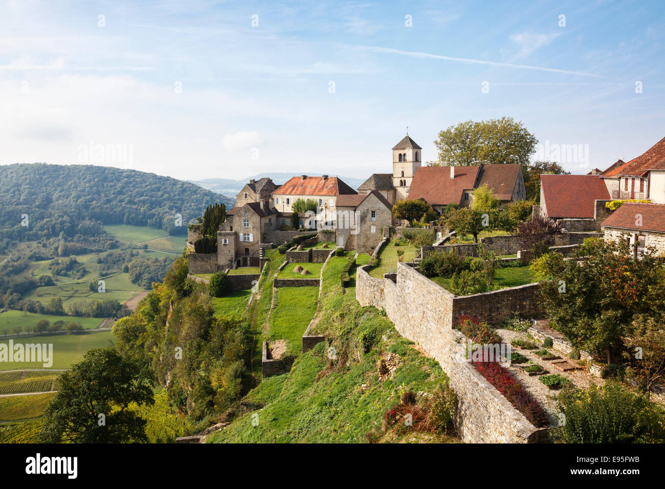 Picturesque hilltop village in wine growing area in rural landscape ...