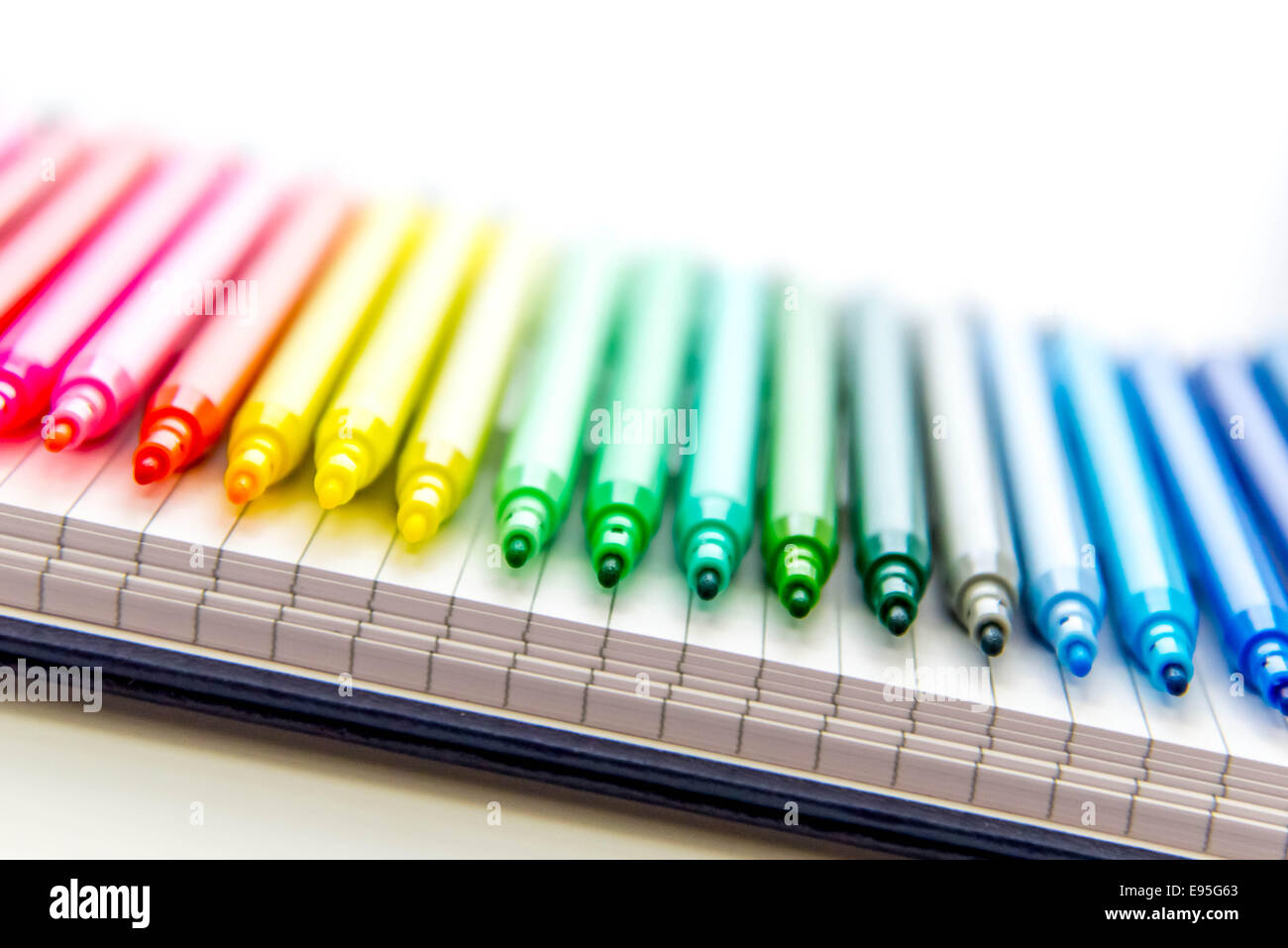 line of multi colored markers Stock Photo - Alamy