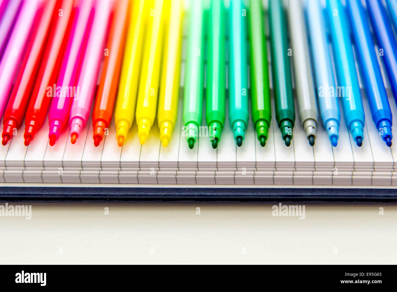 line of multi colored markers Stock Photo - Alamy