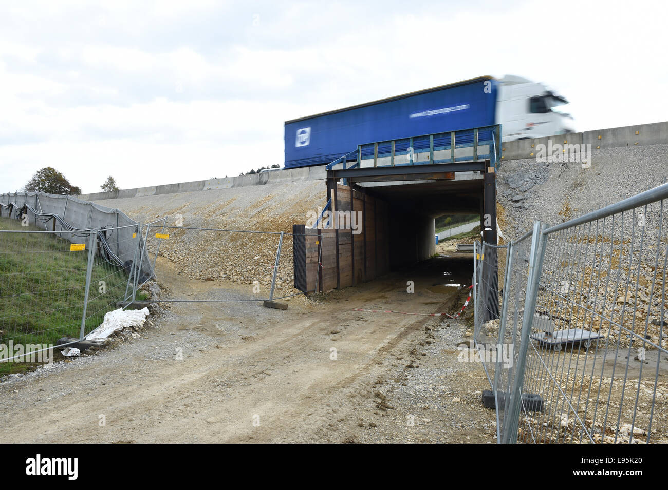 Nellingen, Germany. 20th Oct, 2014. A truck drives over a tunnel at ...