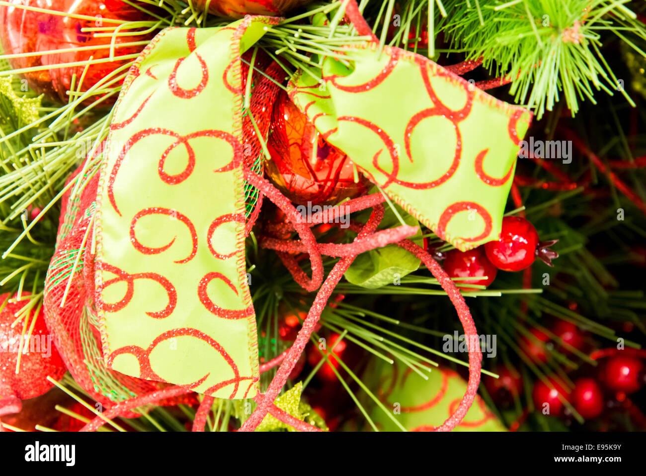 Christmas decorations - green and red ribbon Stock Photo - Alamy