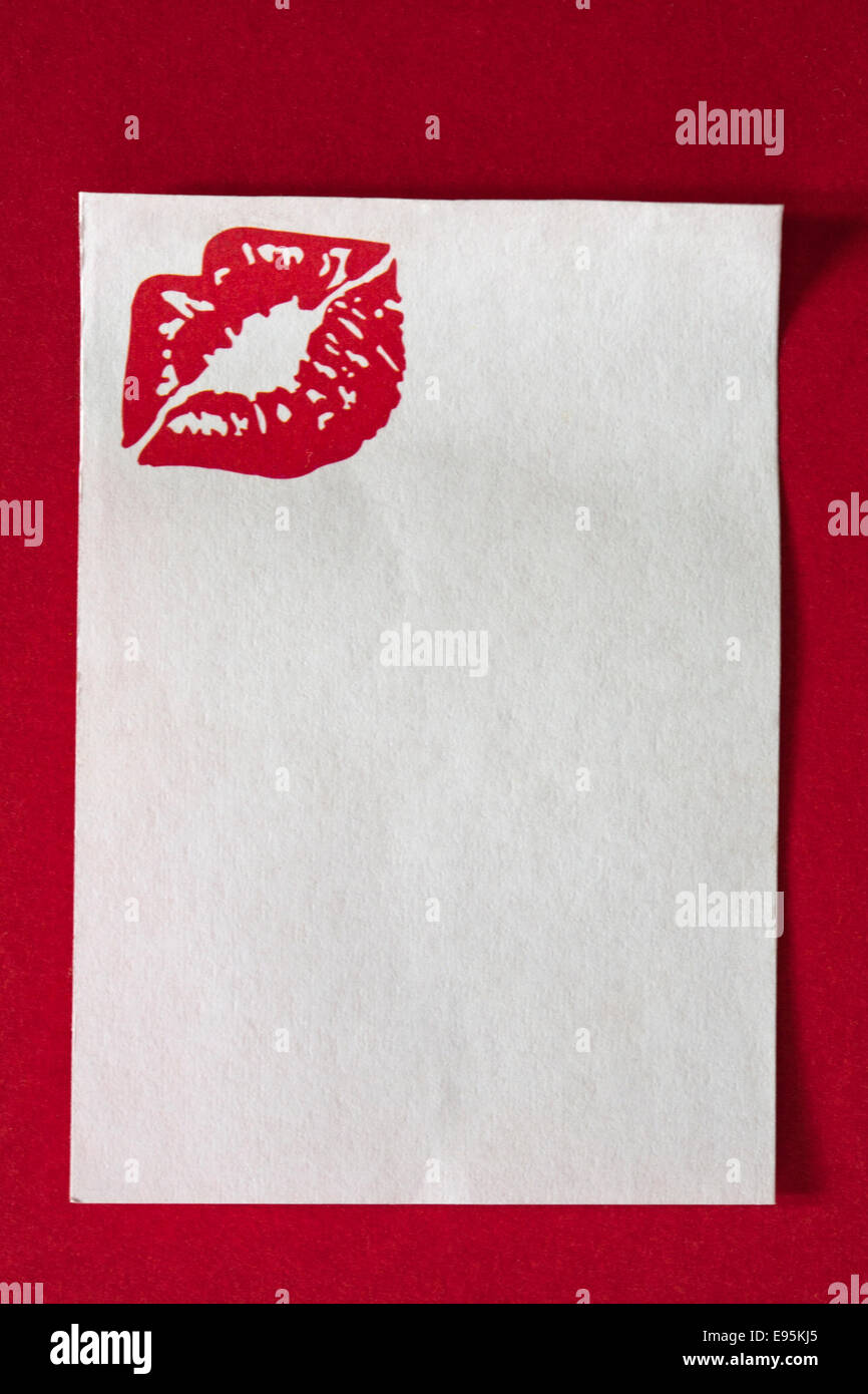 post it note with red lips stuck on red background left blank for own ...