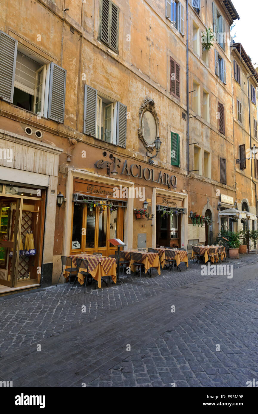 A traditional Italian street in the morning in Rome, Italy Stock Photo ...