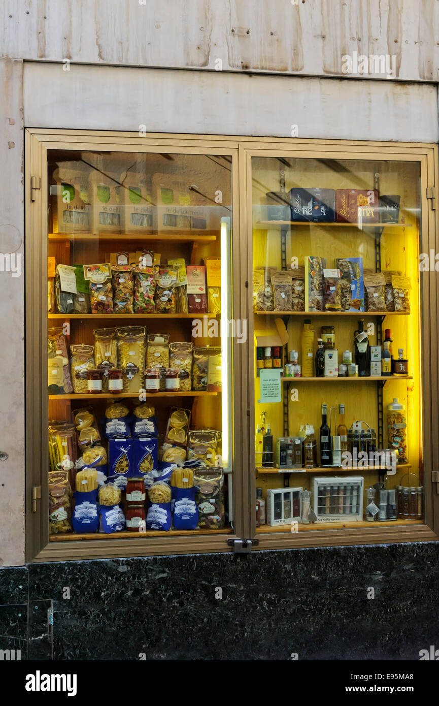 A cabinet on display containing raw pasta and healthy Italian cooking ...