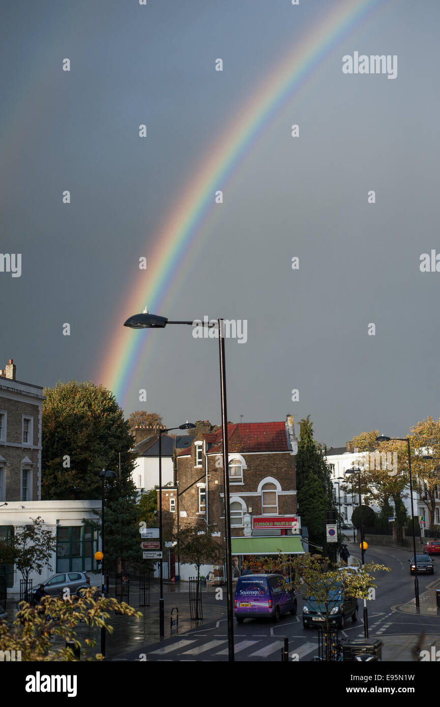 London, UK. 20th Oct, 2014. UK Weather: Rainbow seen in North London ...
