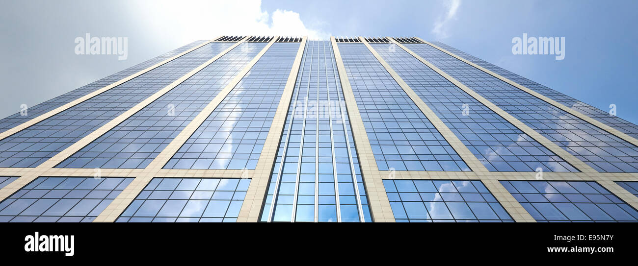 Office building with plate glass walls and gleaming steel structure ...