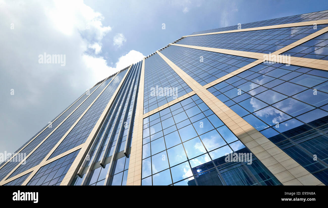 Office building with plate glass walls and gleaming steel structure ...