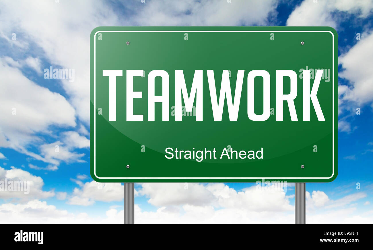 Teamwork on Green Highway Signpost Stock Photo - Alamy