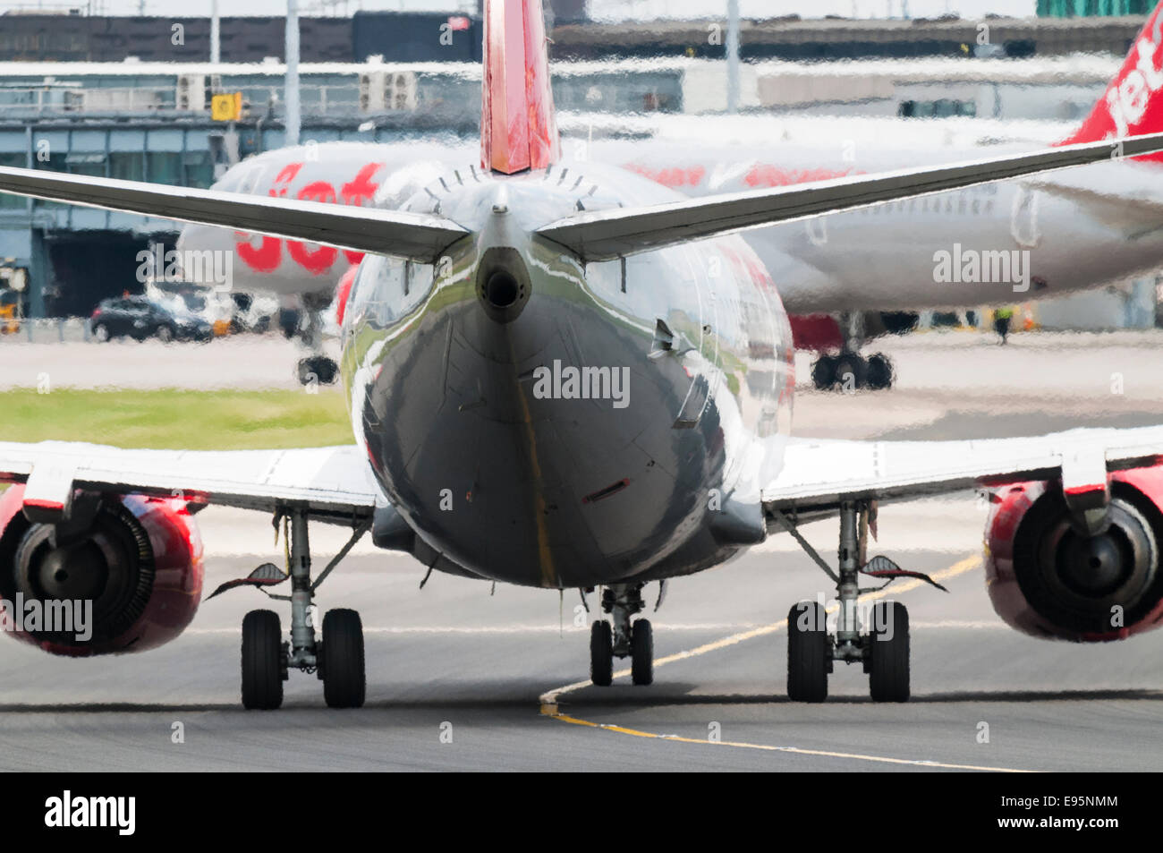 Rear view of a Jet 2.com Boeing 737 aeroplane taxying to the terminal ...