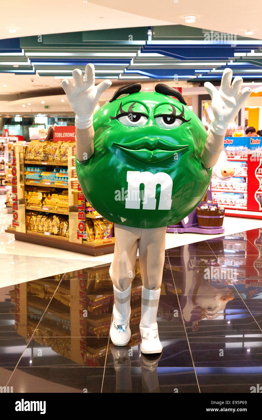 M&Ms sweets advertisement - a man in M&M costume, Dubai airport Duty ...