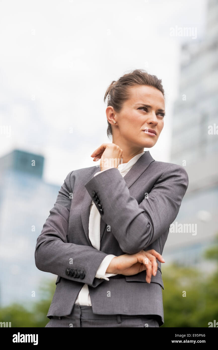 Portrait of serious business woman in office district Stock Photo - Alamy