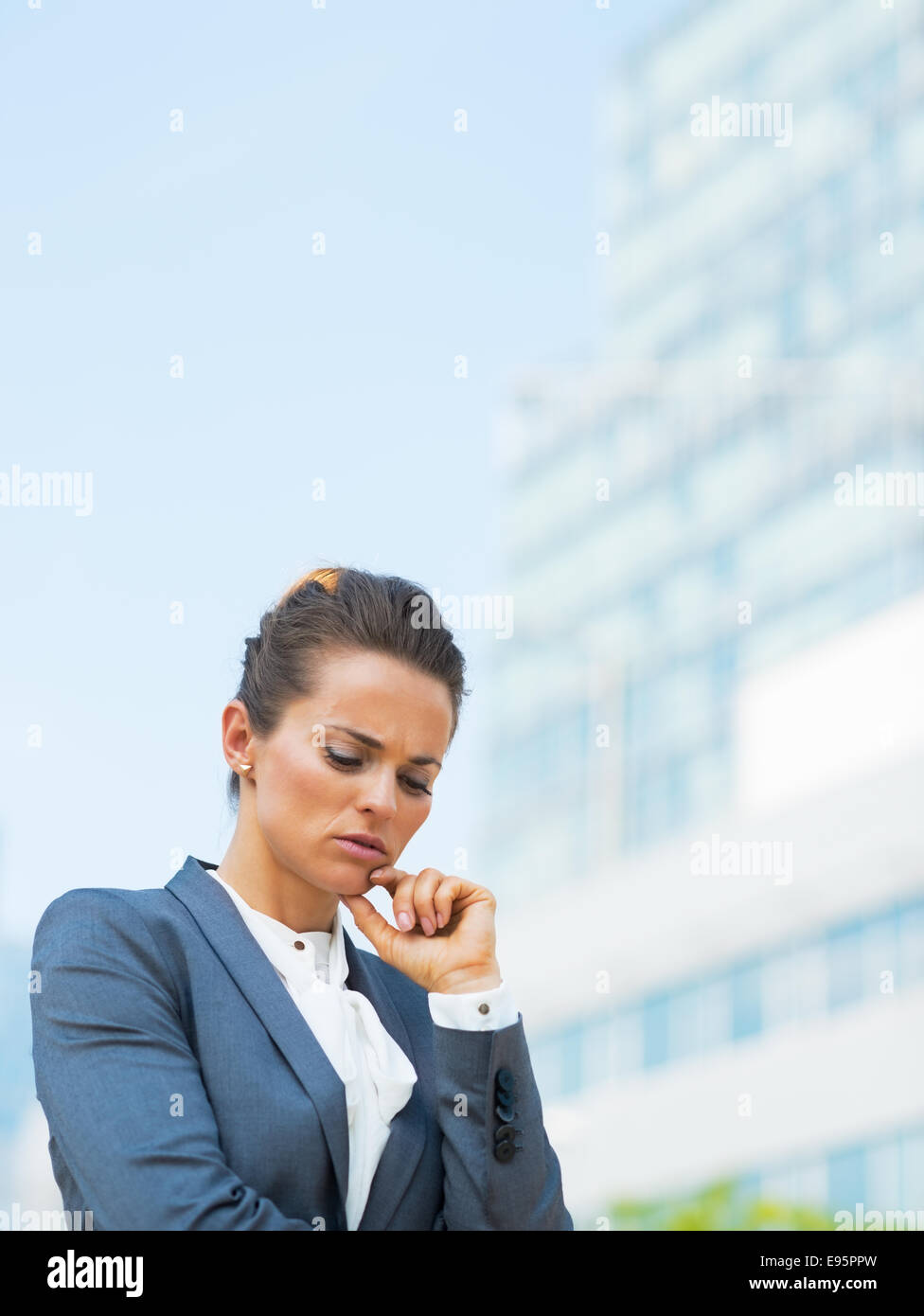 Portrait of stressed business woman in office district Stock Photo - Alamy