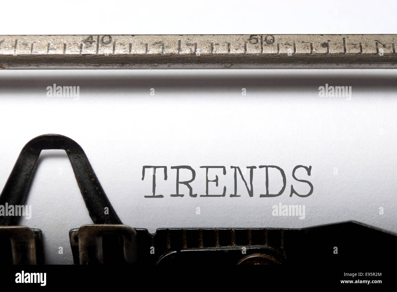Trends heading printed on an old typewriter Stock Photo - Alamy