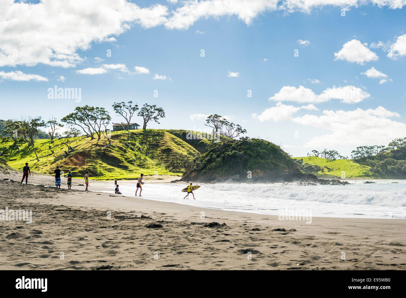 Boys surfing, Elliot Bay, New Zealand Stock Photo - Alamy
