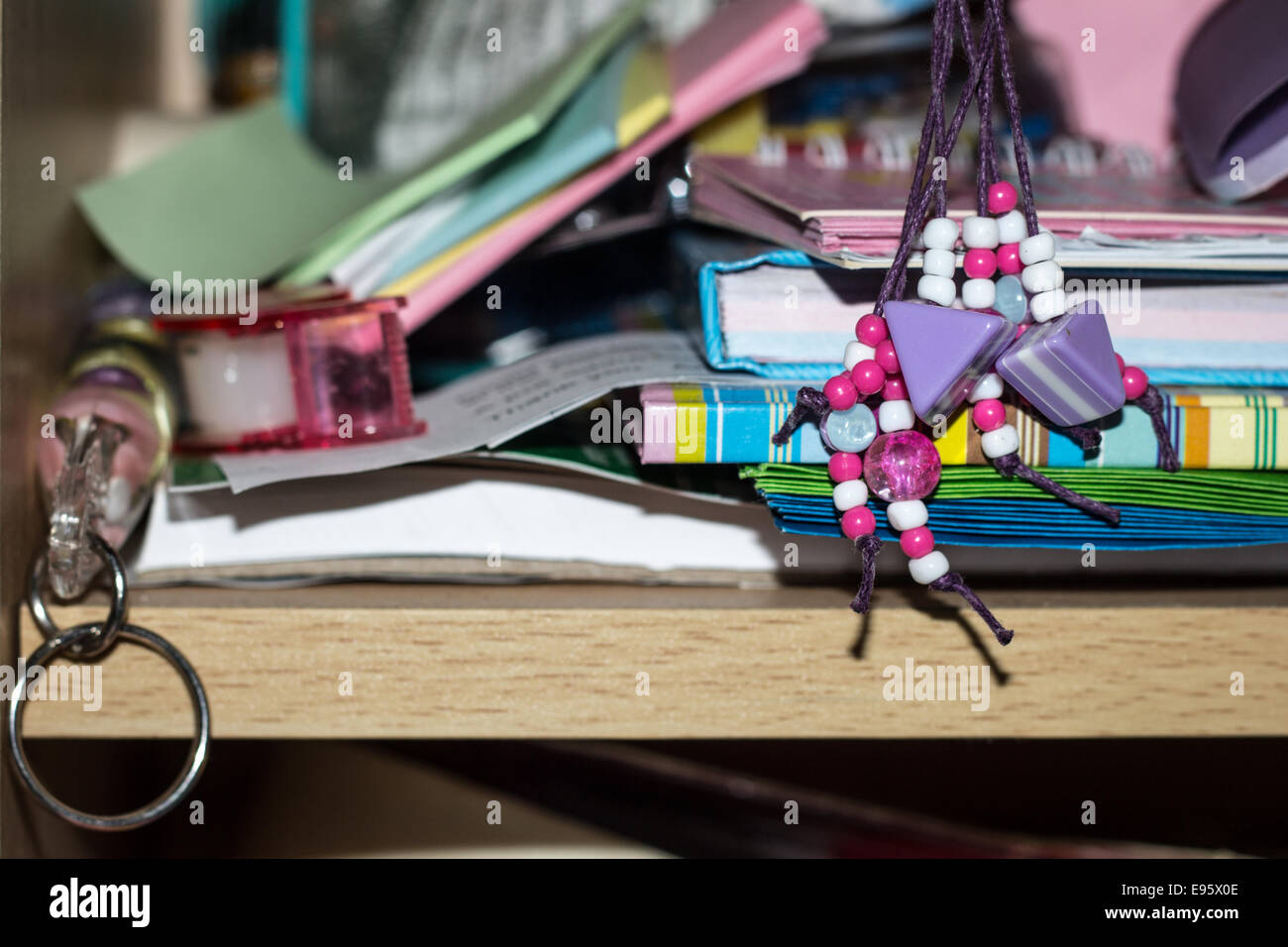 Clutter, oddments and stationary on a bookshelf in a bedroom Stock ...