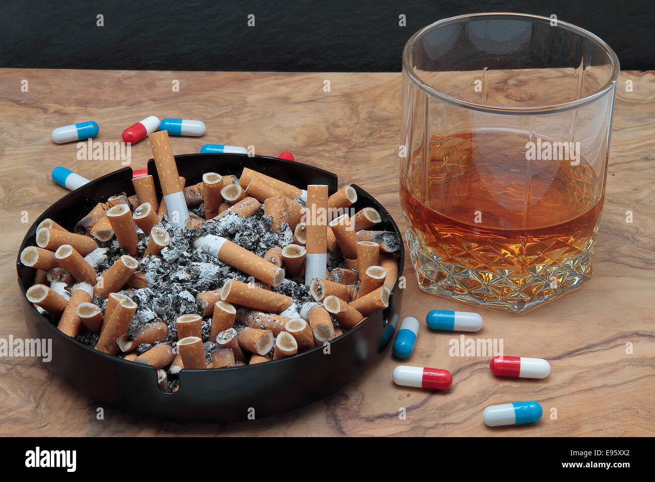 Full Ashtray Cigarettes On Table High Resolution Stock Photography and ...