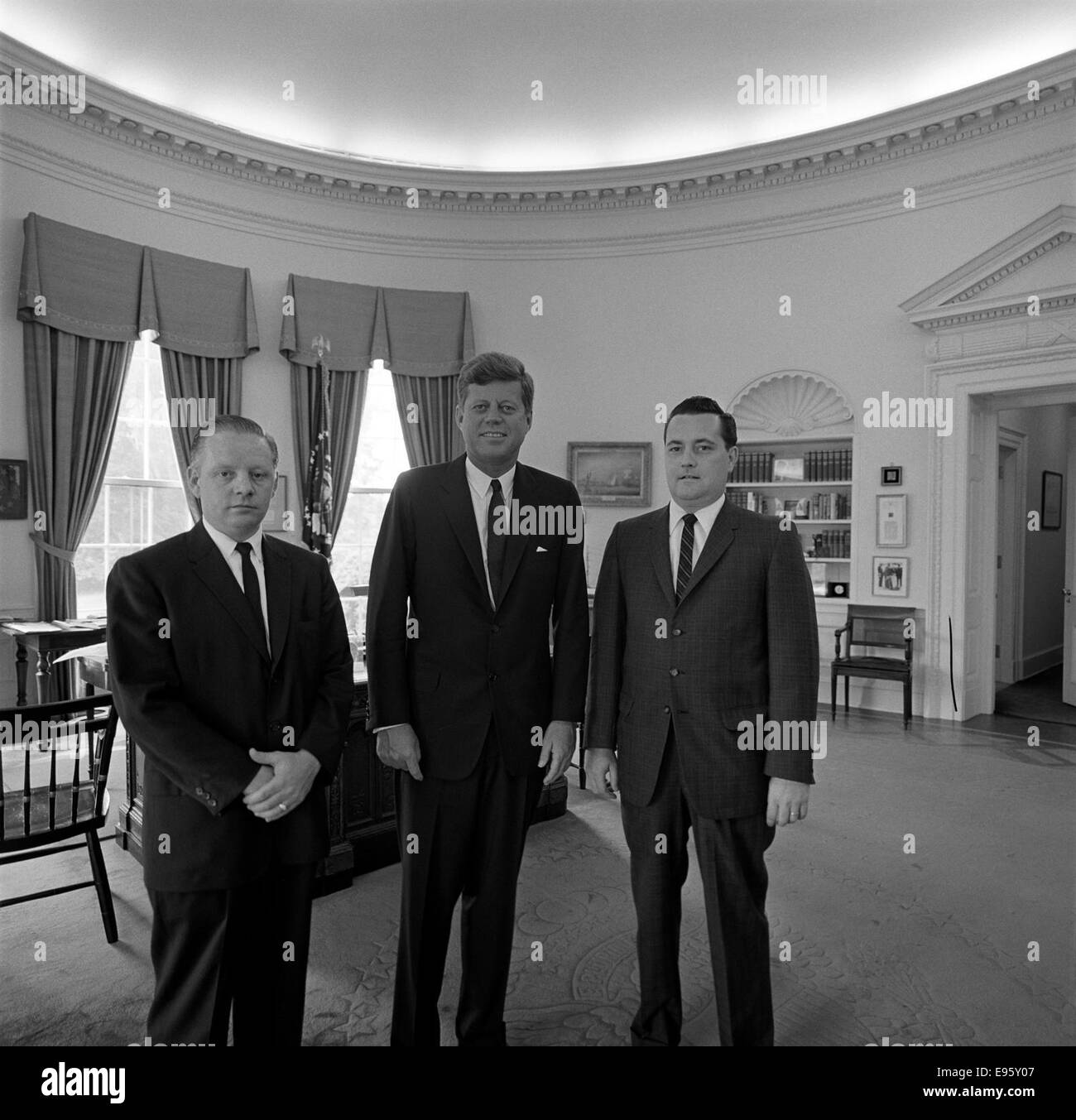 A photograph of President John F. Kennedy with visitors, capturing a ...