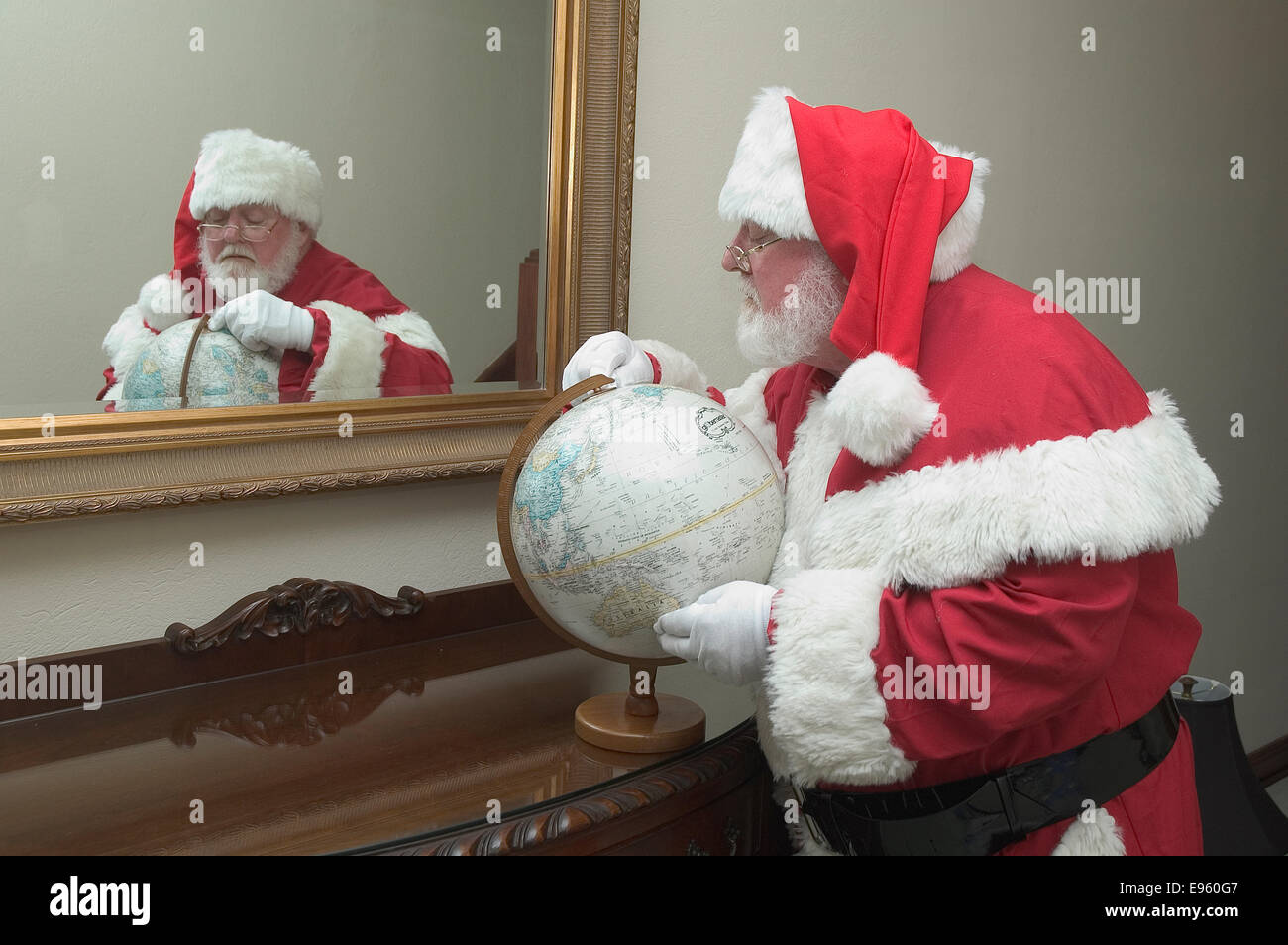 Santa planning his route Stock Photo - Alamy