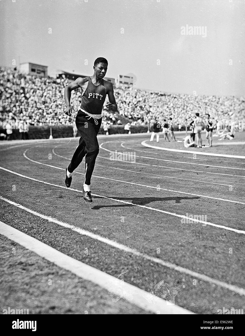 This photograph shows a University of Pittsburgh runner competing at ...