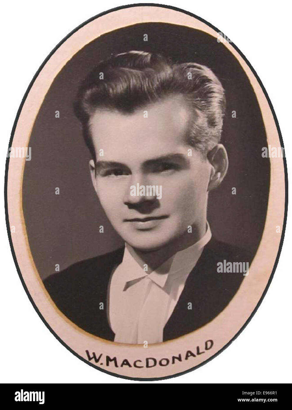 This photograph features W MacDonald, a notable individual captured in ...