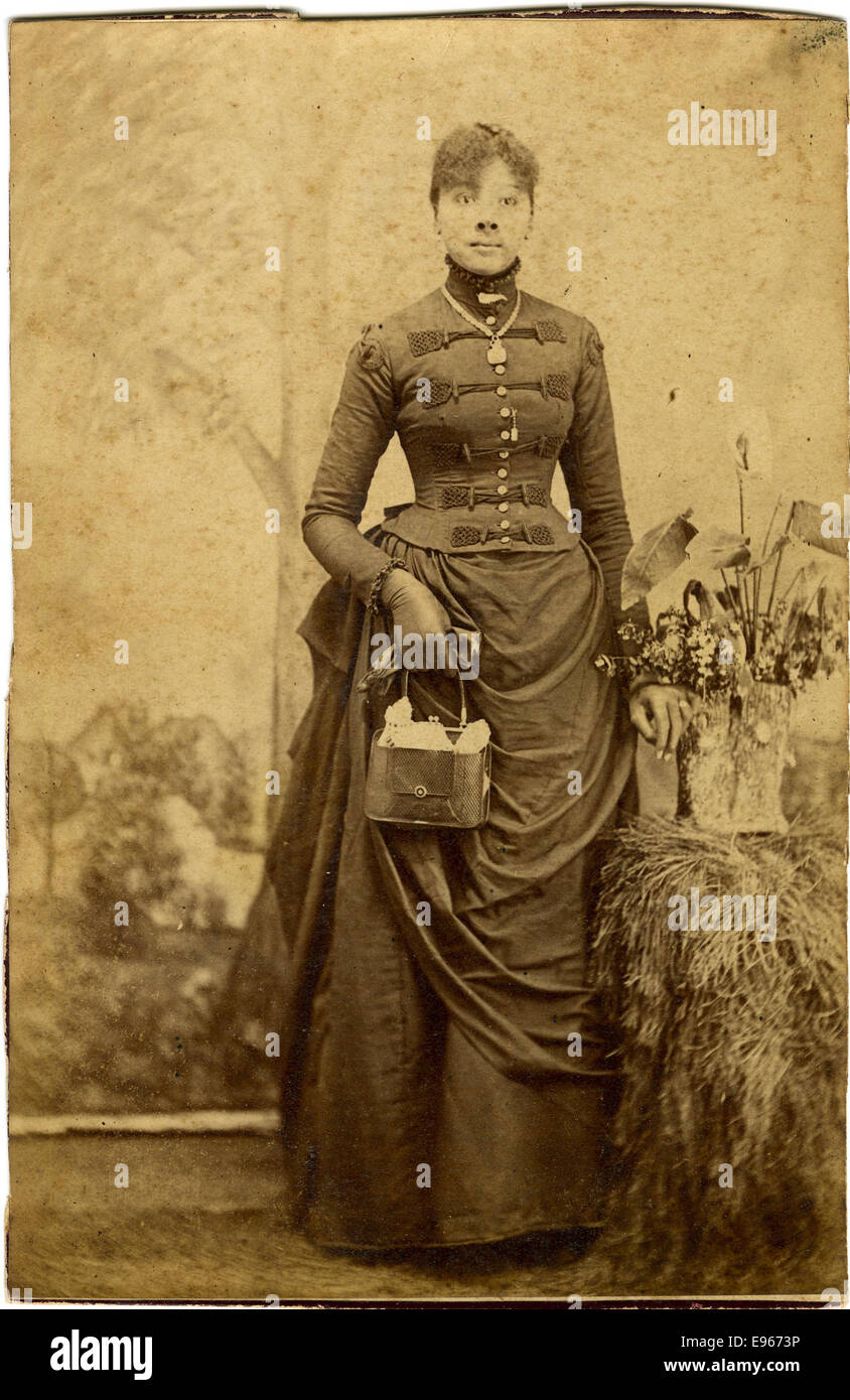 This photograph features Annie Gregory, captured in a portrait format ...