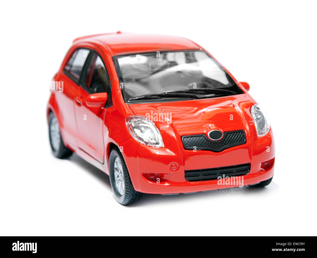 model of red car is isolated on a white background Stock Photo - Alamy