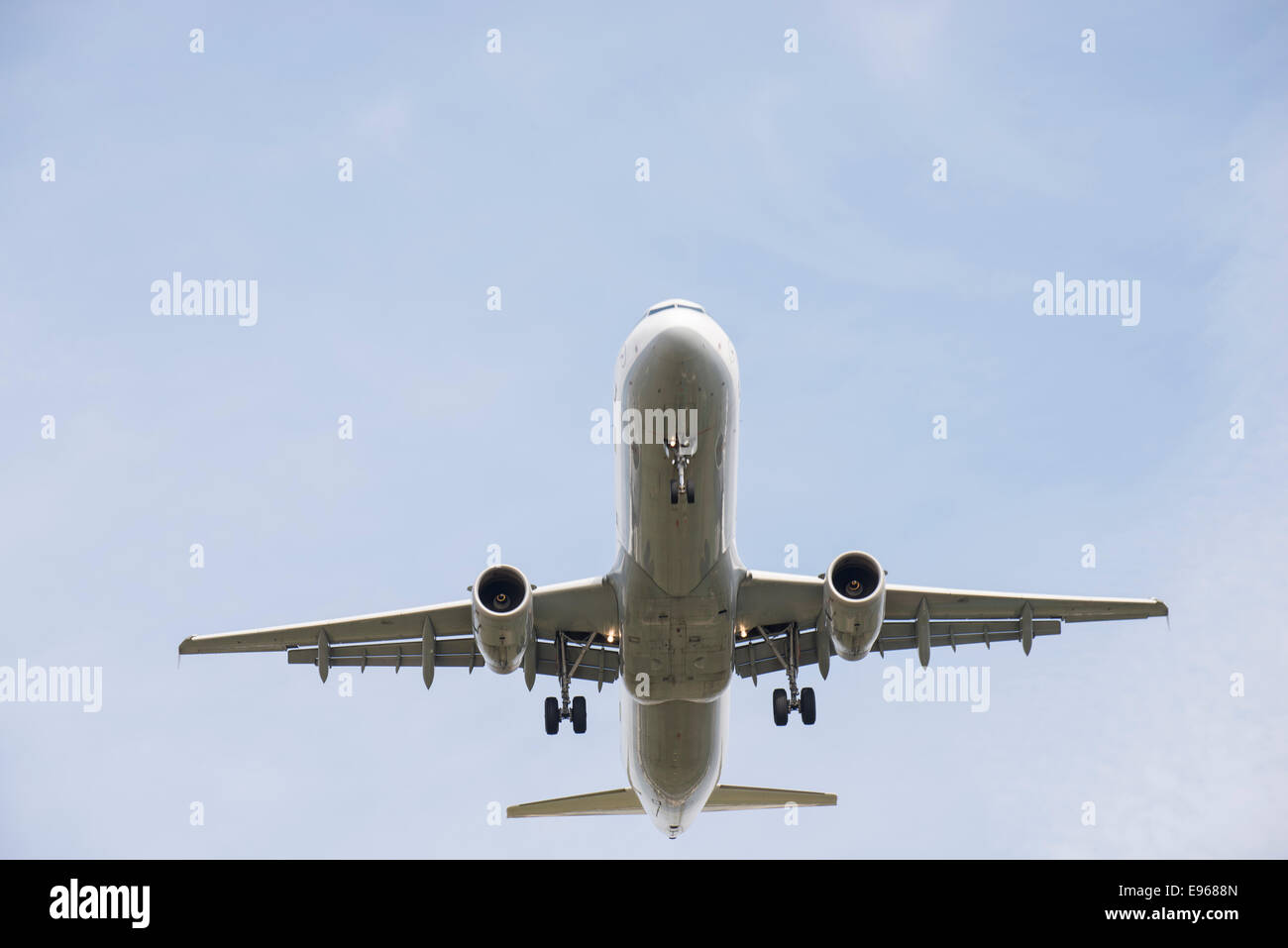 plane flying towards its destination Stock Photo - Alamy