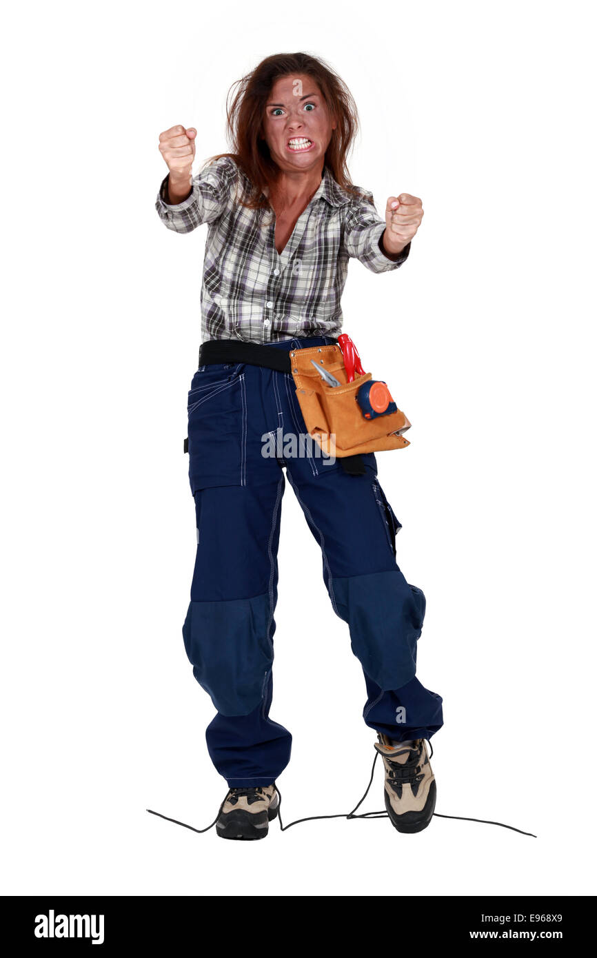 Woman carpenter getting mad Stock Photo - Alamy