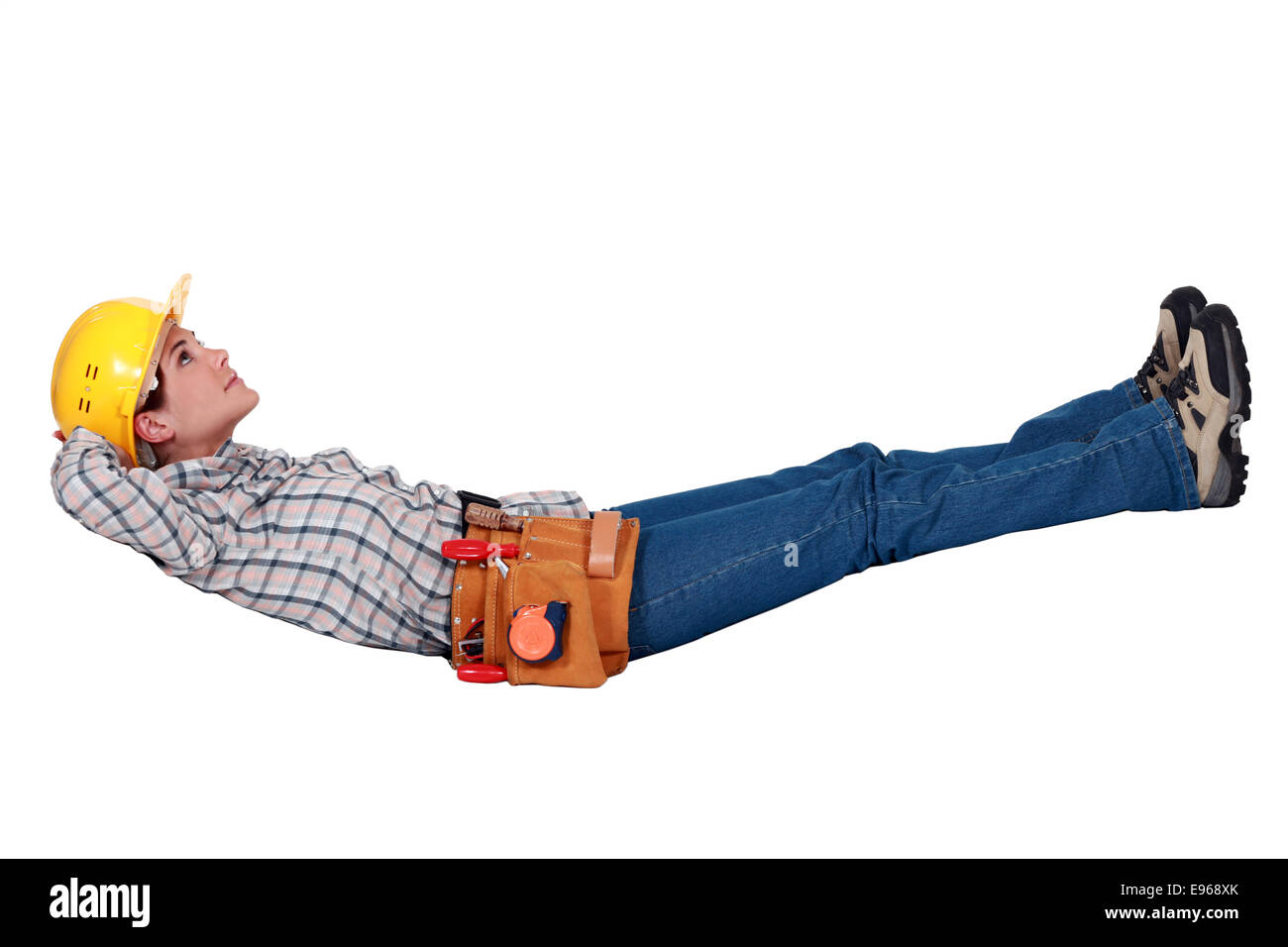 Female laborer relaxing Stock Photo - Alamy