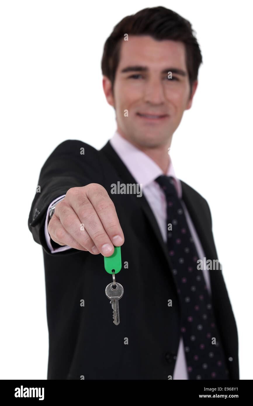 Estate-agent dangling keys Stock Photo - Alamy