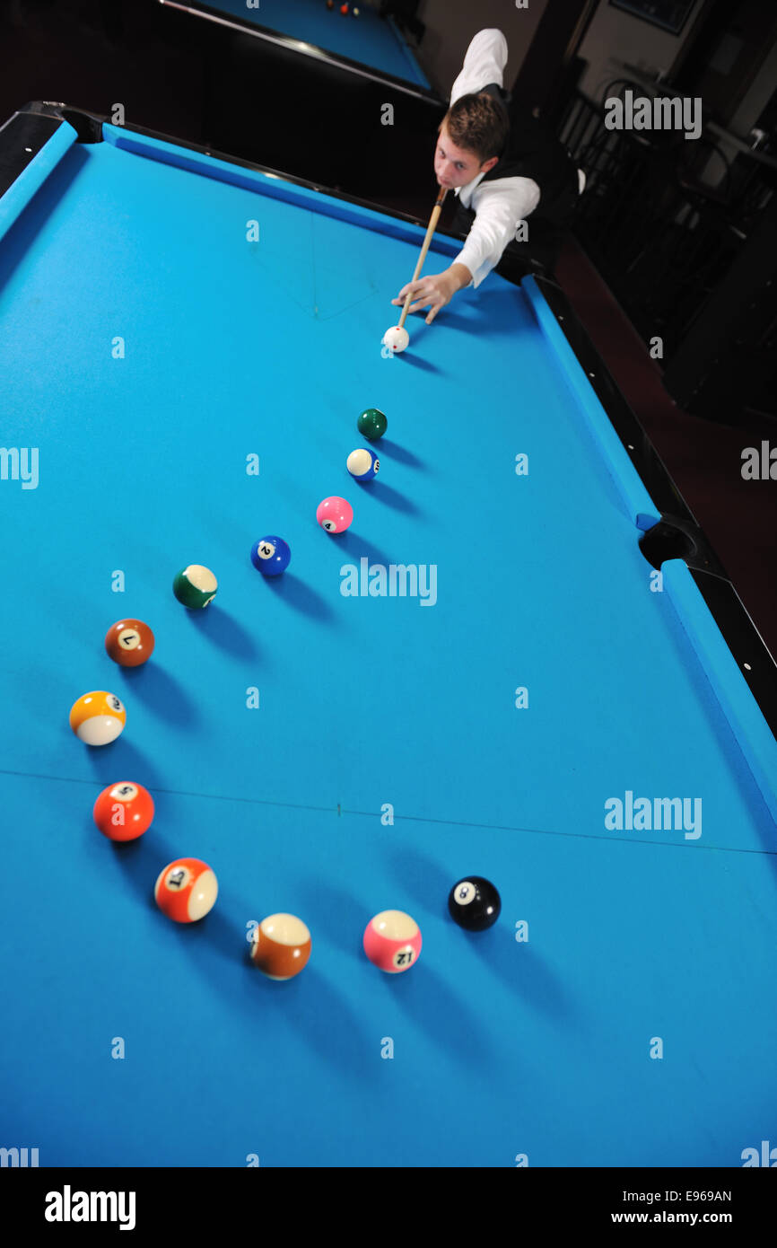 young man play pro billiard game Stock Photo - Alamy