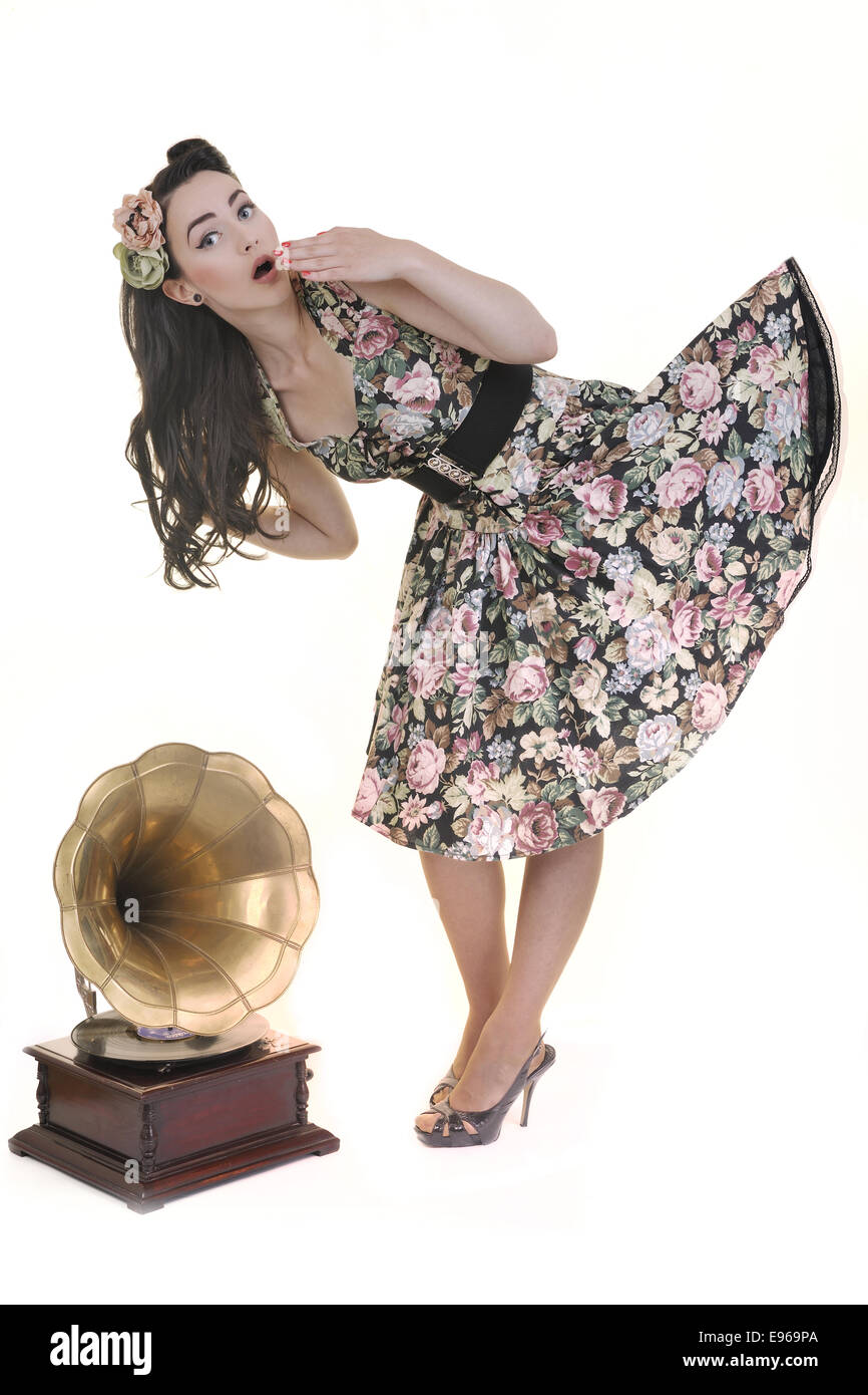 pretty girl listening music on old gramophone Stock Photo - Alamy