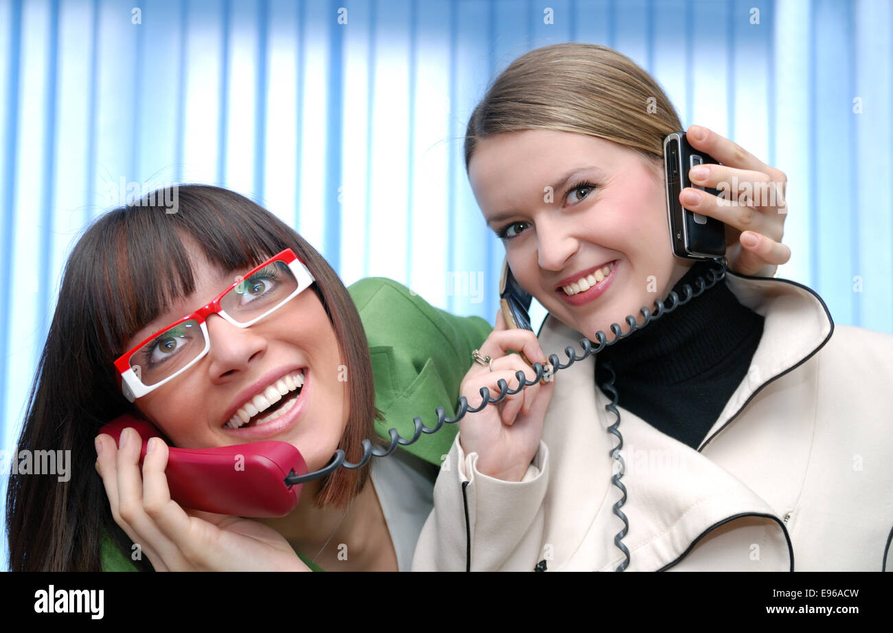 .office fun with telephones Stock Photo - Alamy