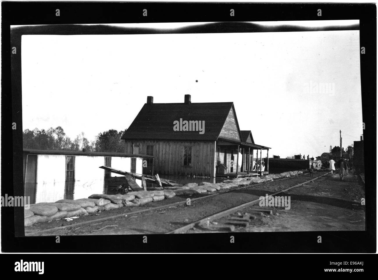 A photograph showing the city of Helena, likely during a flood, with ...