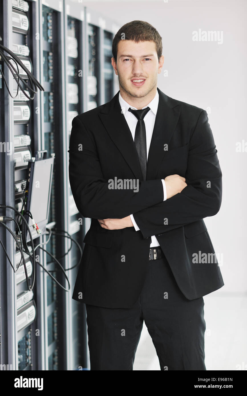 young it engeneer in datacenter server room Stock Photo - Alamy