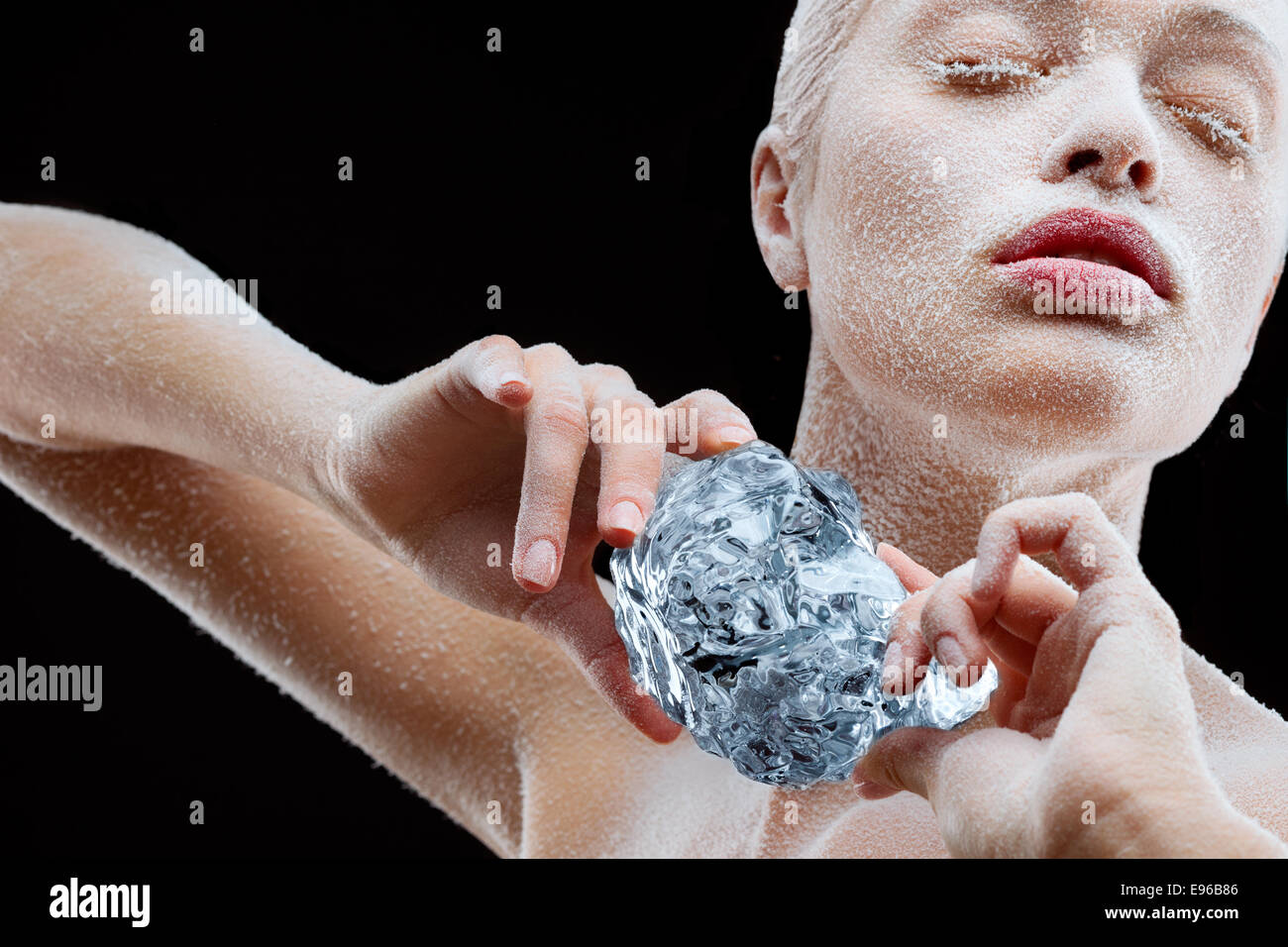 Frozen woman with block of ice Stock Photo - Alamy