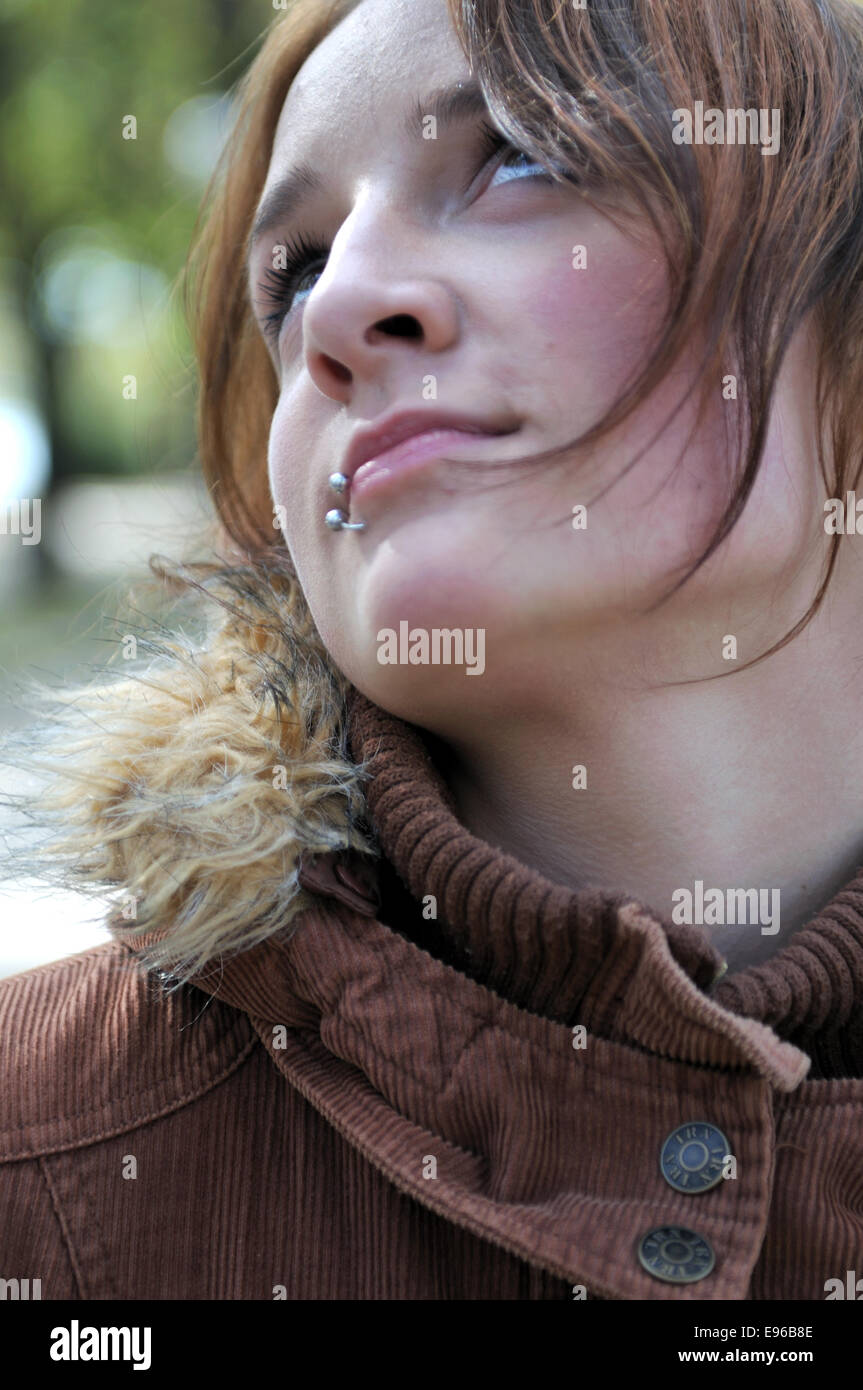 Young woman looking Stock Photo - Alamy