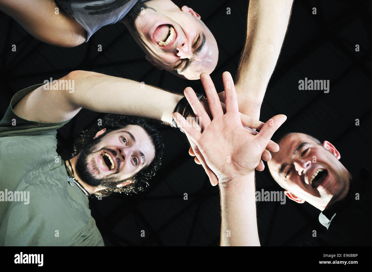 three man group Stock Photo - Alamy