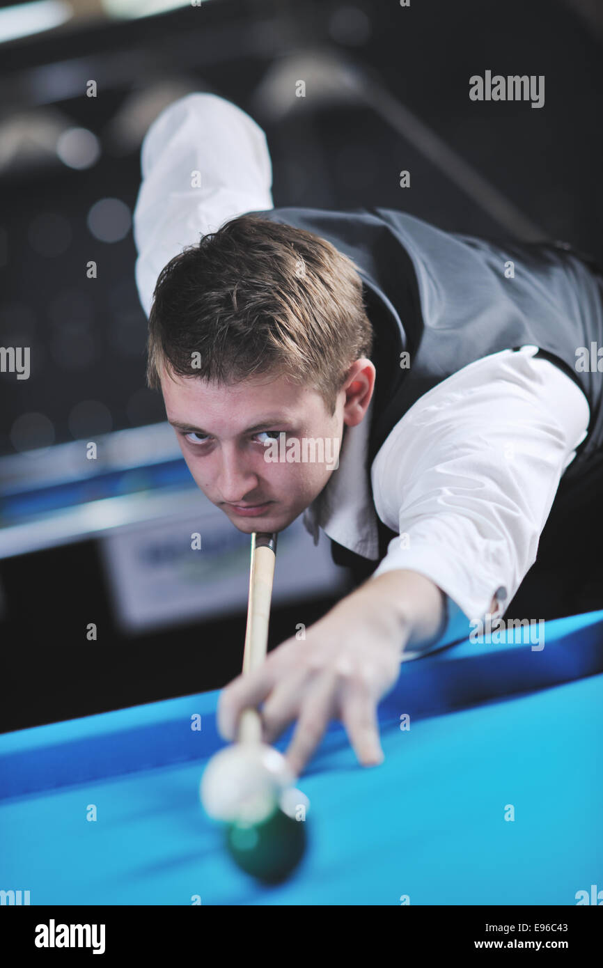 young man play pro billiard game Stock Photo - Alamy
