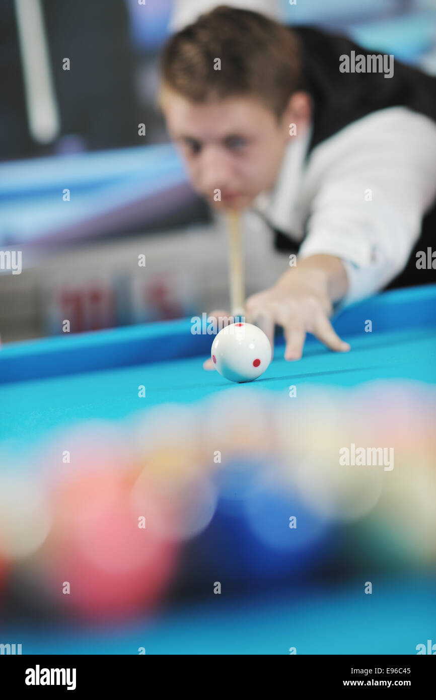 young man play pro billiard game Stock Photo - Alamy