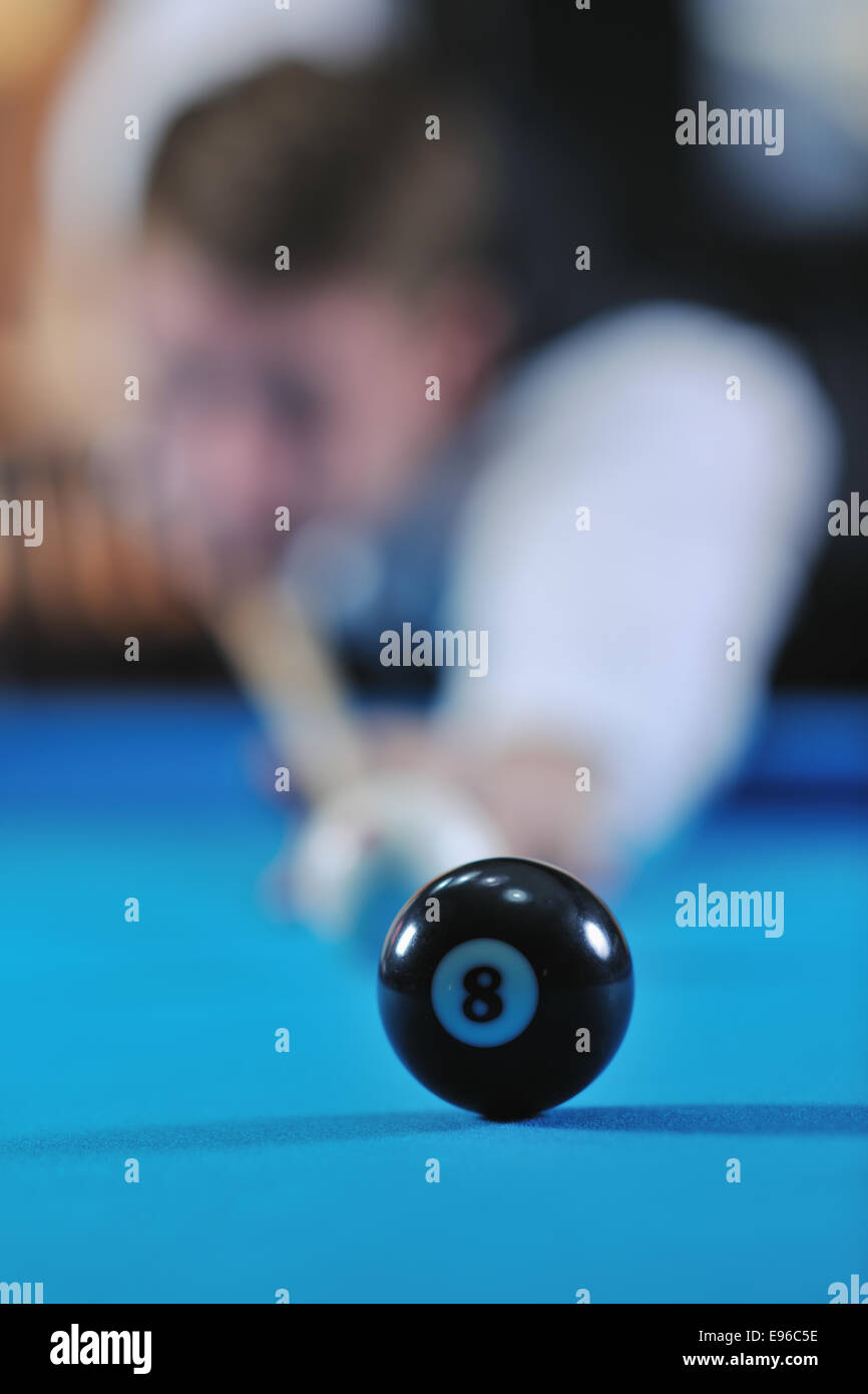 young man play pro billiard game Stock Photo - Alamy