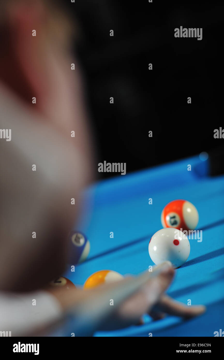 young man play pro billiard game Stock Photo - Alamy