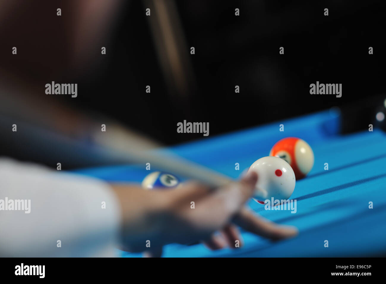 young man play pro billiard game Stock Photo - Alamy