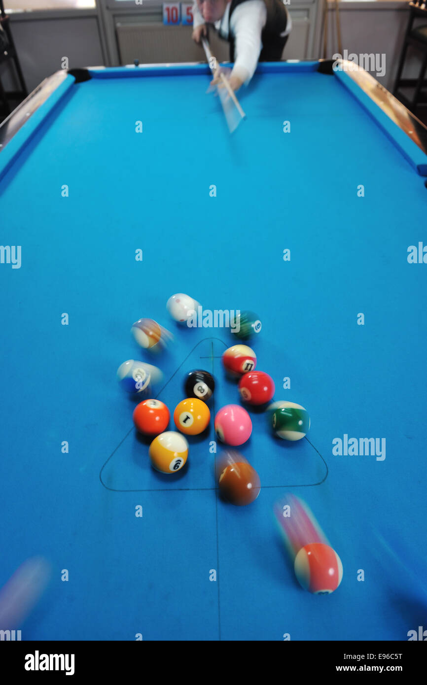 young man play pro billiard game Stock Photo - Alamy