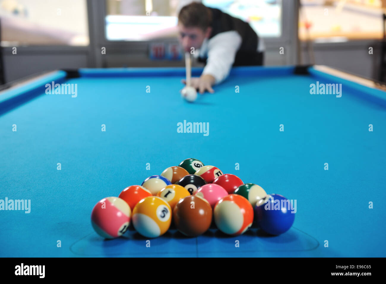 young man play pro billiard game Stock Photo - Alamy