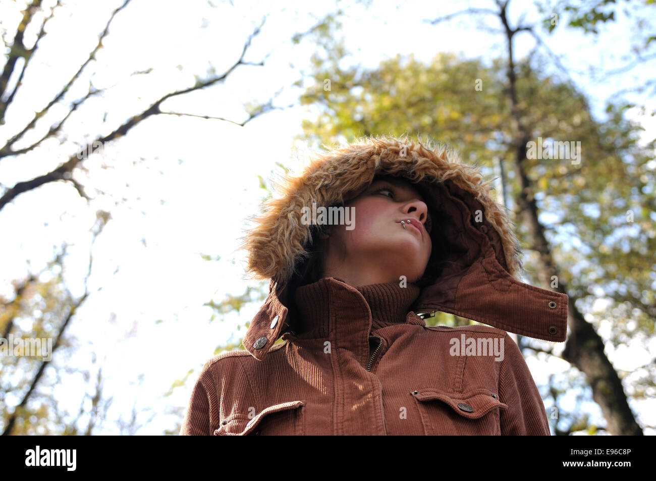 Young woman looking Stock Photo - Alamy