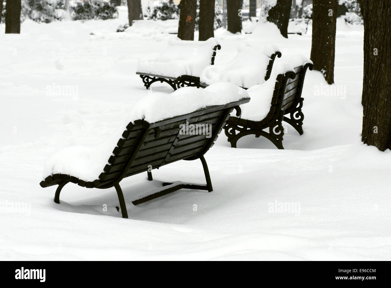 Bench at snow Stock Photo - Alamy