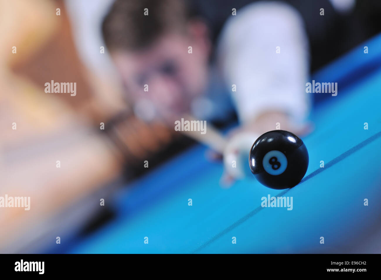 young man play pro billiard game Stock Photo - Alamy