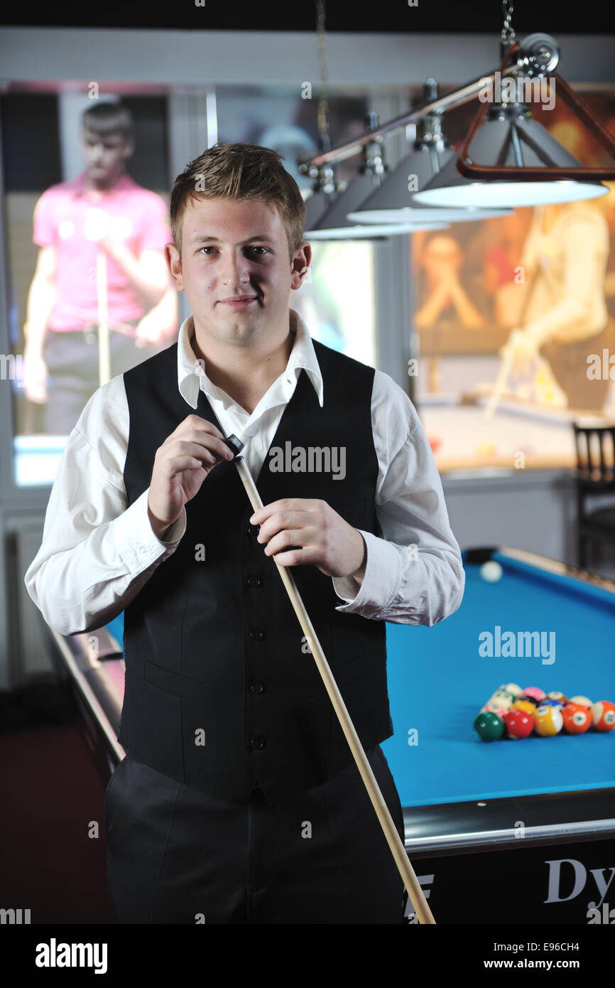 young man play pro billiard game Stock Photo - Alamy
